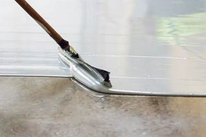 Epoxy Flooring Applied with Squeegee | Wolverine Coatings Corporation